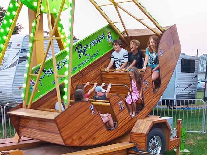 That wooden pirate ship on wheels might be the most creative carnival ride you'll see all year, arrr matey.