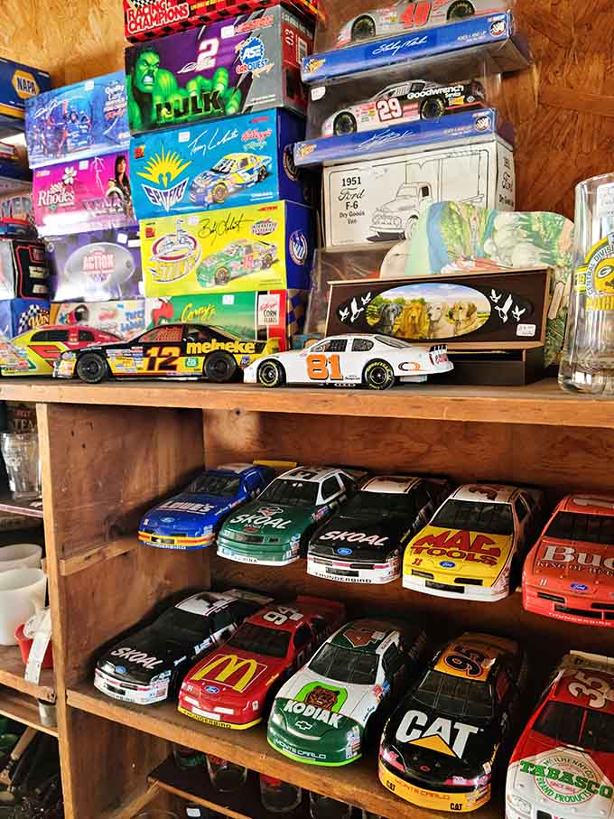 Collectible race cars lined up like a NASCAR pit row, minus the noise but with all the nostalgia.
