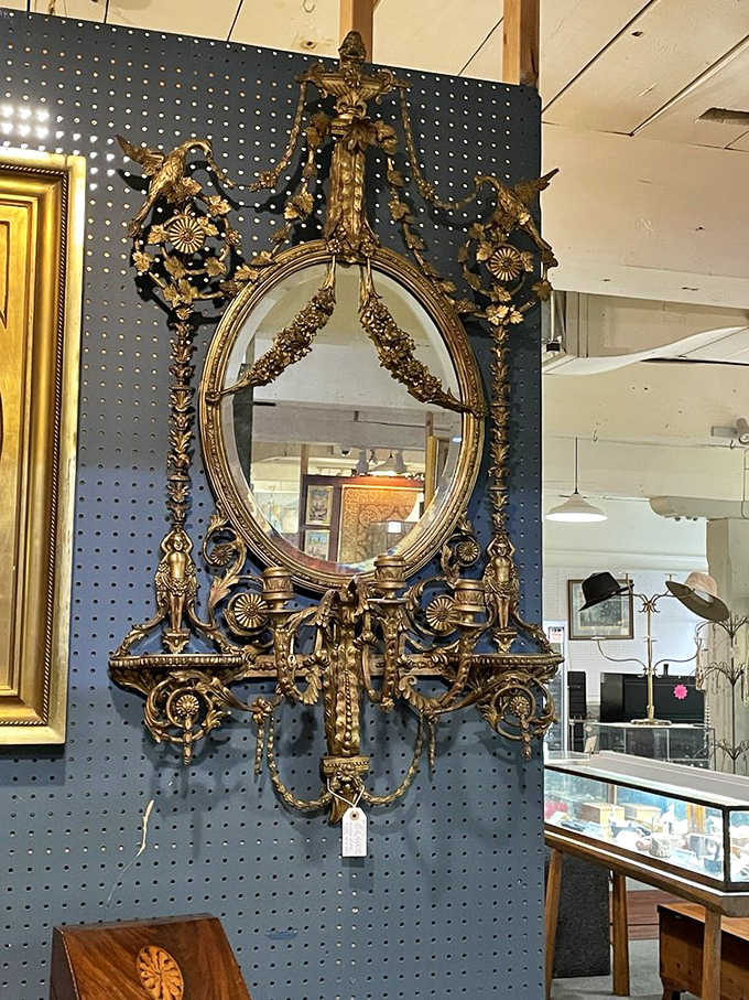 This ornate girandole mirror has reflected more history than most museums—and it's actually for sale.