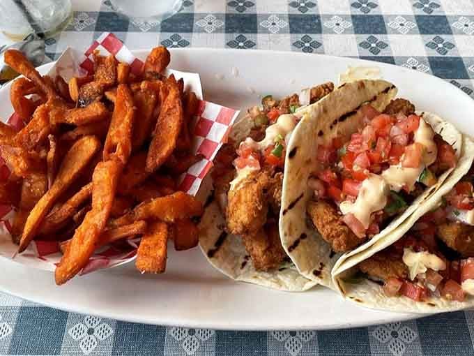 Fish tacos with sweet potato fries prove that coastal cuisine doesn't always need to follow the rulebook perfectly.