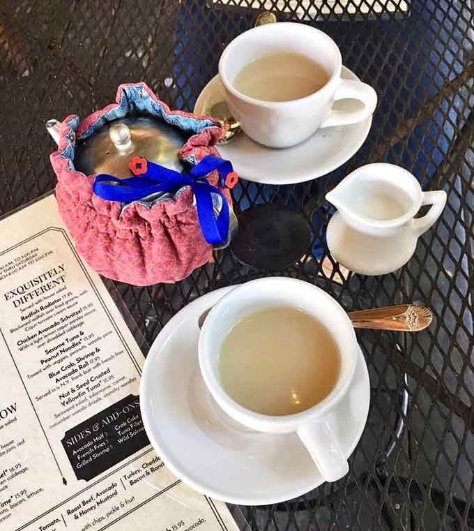 Tea service with proper china and a cozy basket makes you feel fancy without requiring you to change out of comfortable clothes.