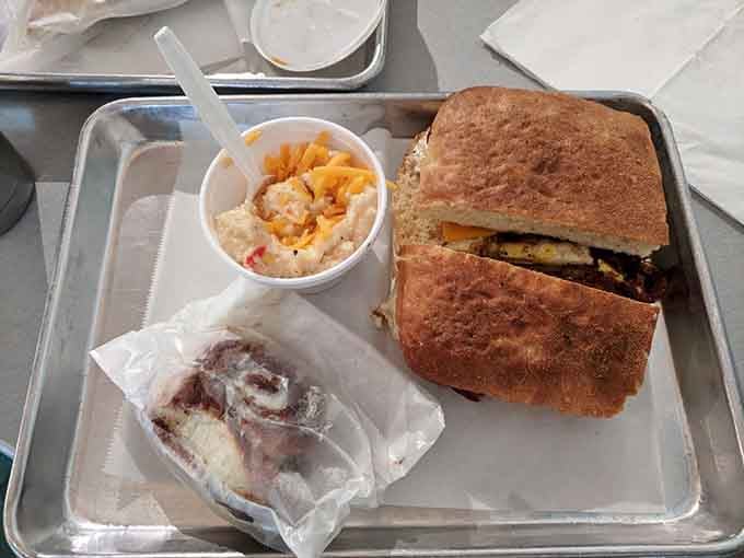 This everything bagel sandwich stuffed with eggs and melted cheese demonstrates that simple ingredients can create breakfast perfection.