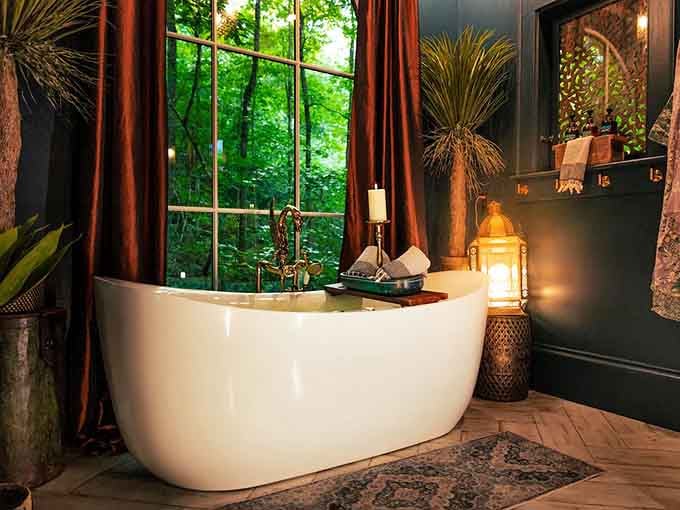 Soaking in this tub with forest views might just ruin regular bathrooms for you forever.