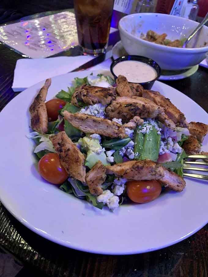 This Cobb salad comes loaded with grilled chicken and fresh vegetables, proving that even health-conscious choices can be deeply satisfying here.