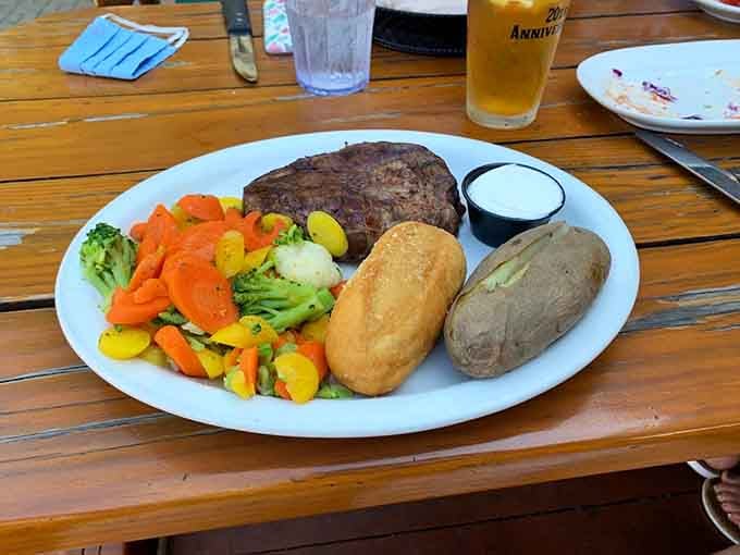 Colorful vegetables arranged like a rainbow next to a gorgeous steak make eating your greens feel less like a chore.
