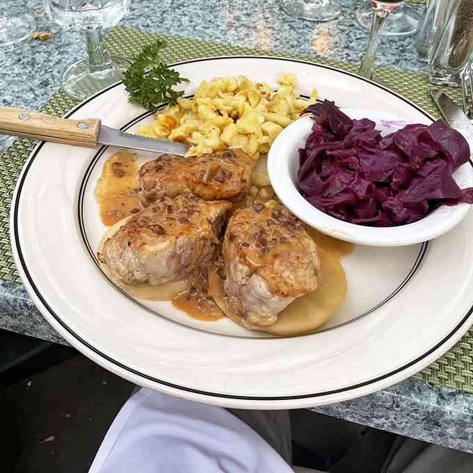 Tender pork medallions with spätzle and red cabbage deliver the kind of hearty satisfaction that makes you understand European contentment.