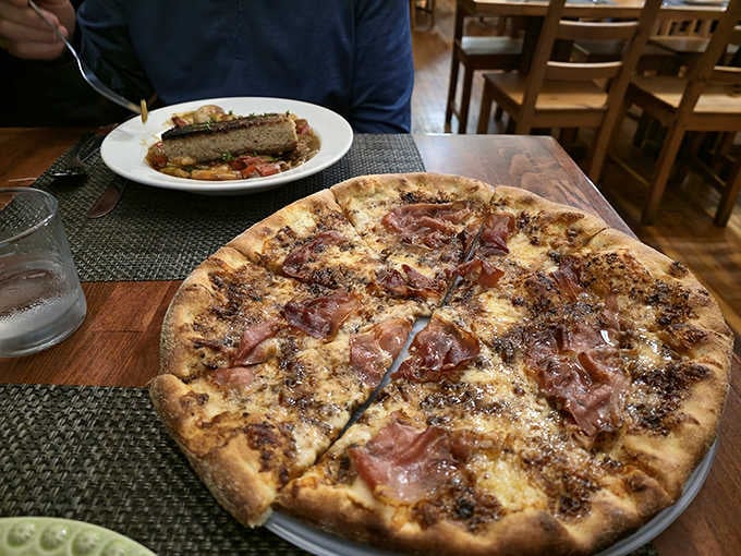 Prosciutto on pizza with what appears to be balsamic glaze is the kind of sophistication you don't expect in rural Virginia.