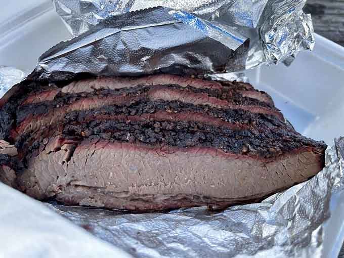 That smoke ring tells you everything you need to know: this brisket means business, championship-level business.