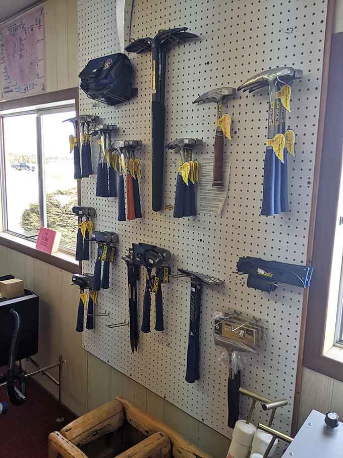 Rock hounding tools line the wall, ready to turn weekend warriors into amateur geologists with serious equipment.