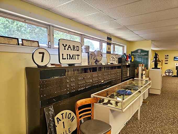 That "Yard Limit" sign and switchboard represent the nerve center of railroad operations from a bygone era.