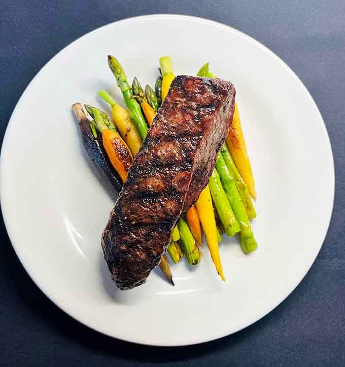 Dry-aged Wagyu sliced and fanned like edible art, because sometimes steak deserves a standing ovation.