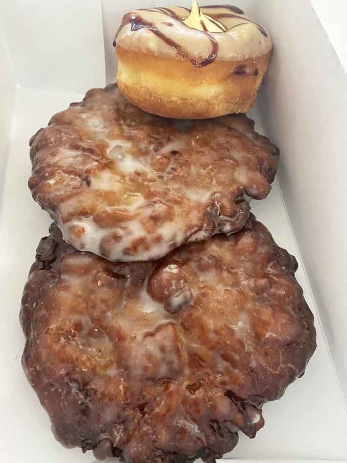 Apple fritters the size of your fist paired with cream cheese glazed beauties that practically glow with freshness.