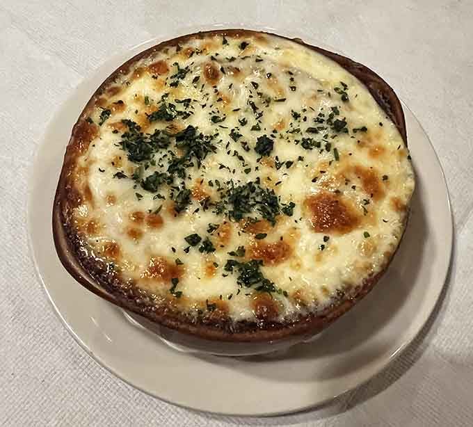 French onion soup baked with bubbling cheese creates that satisfying pull when you dig in with your spoon.
