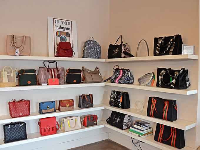 That Instagram reminder sign knows exactly what you're thinking as you admire rows of designer handbags worth photographing and coveting.