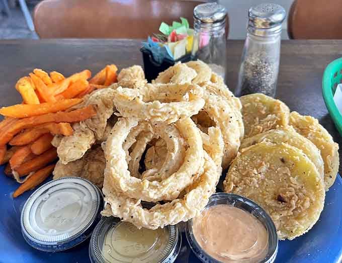 When fried green tomatoes meet onion rings, it's like the Avengers assembled on your plate, only tastier.