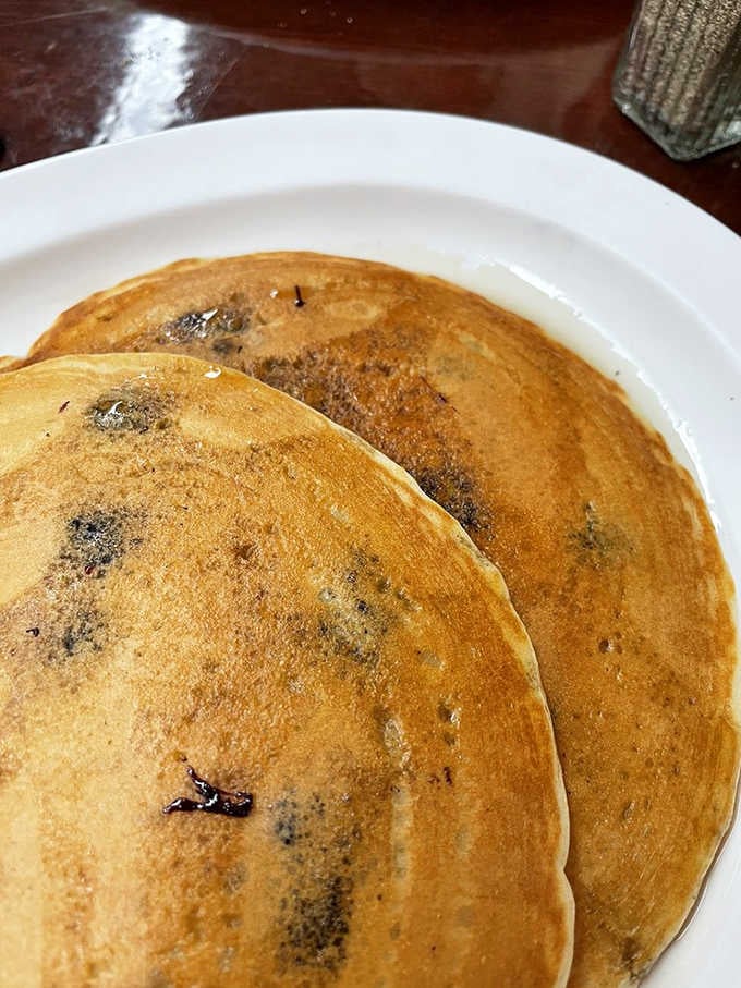 Golden blueberry pancakes that look like they jumped straight from your grandmother's kitchen onto your plate with love.