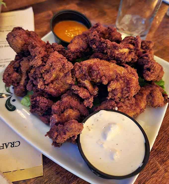 Golden, crispy chicken that looks like it graduated summa cum laude from the school of perfect bar food.
