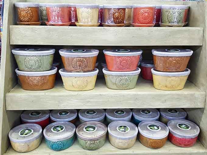 Rows of handmade candles in earthy tones offer more color options than your last paint store visit, but infinitely more pleasant.