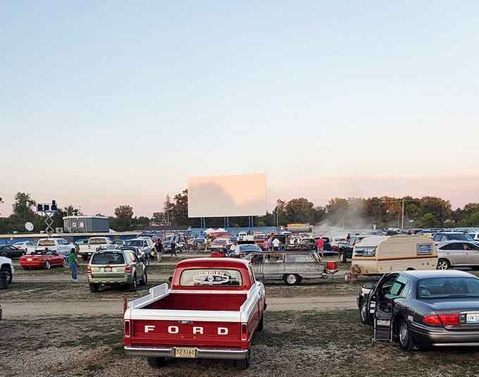 Classic trucks and modern rides unite in democratic harmony, because good movies don't discriminate by vehicle year.