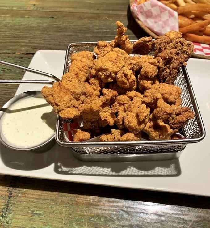 Fried alligator in Connecticut because apparently someone decided to bring the bayou to bowling night.