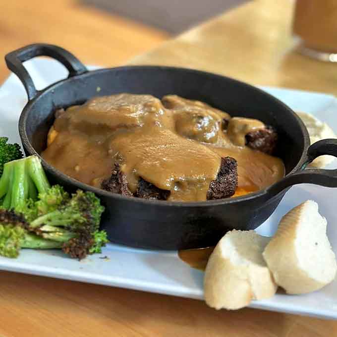 Braised beef hutspot arrives in a skillet like it's auditioning for a cooking show you'd actually watch.