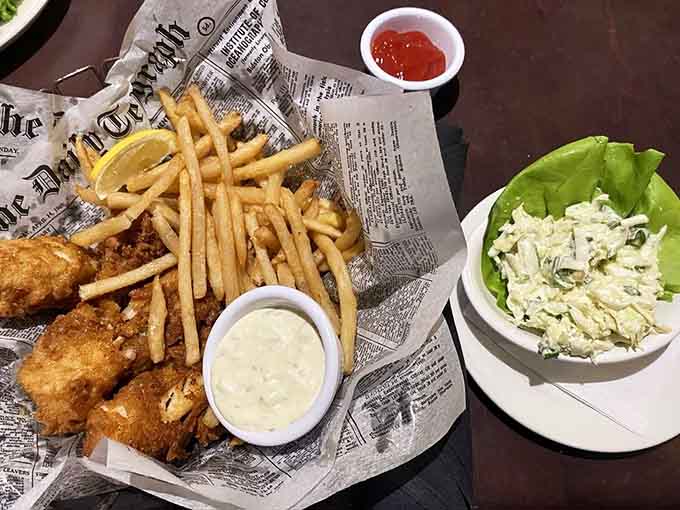 Fish and chips done right, proving that newspaper presentation never goes out of style or taste.