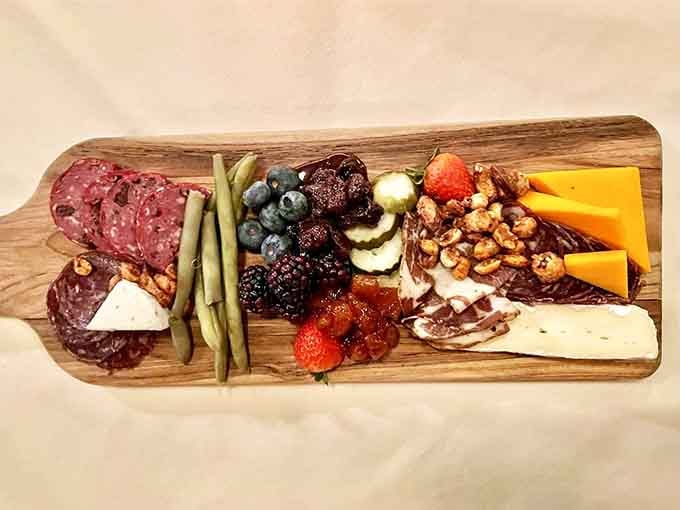 This charcuterie board has more personality than most people's entire refrigerators&mdash;salami, berries, nuts, and cheese living their best life together.
