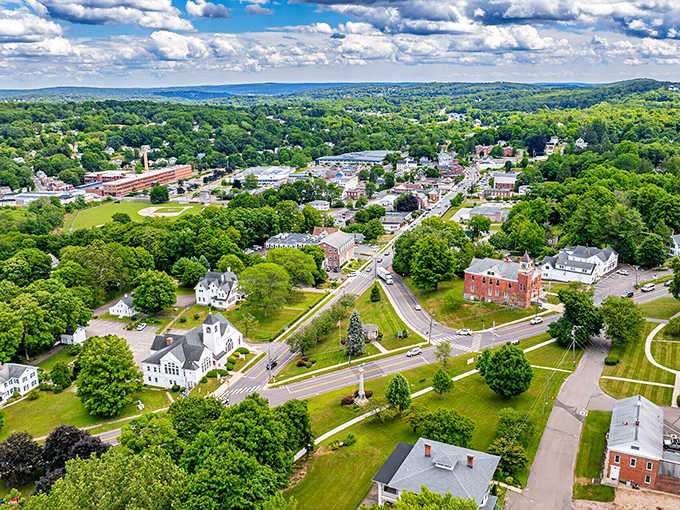 Aerial views reveal a town that kept its green spaces instead of paving everything for luxury condos.