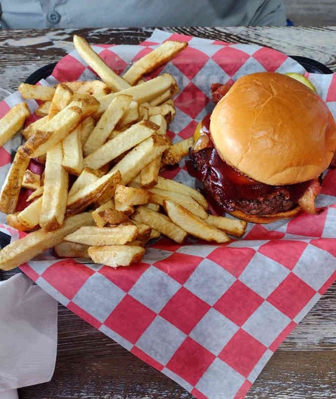 A cowboy cheeseburger with fresh-cut fries that could make a vegetarian reconsider their life choices, just briefly.