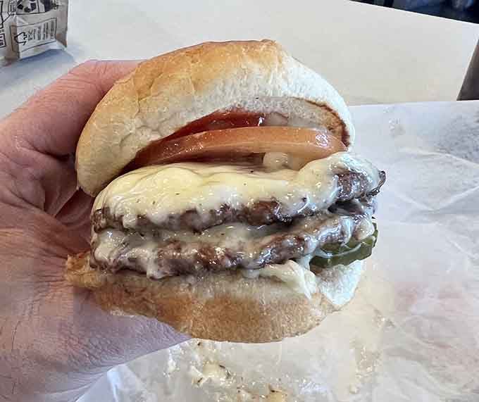 Double the patties, double the melted cheese, double the reason you'll be planning your next visit immediately.