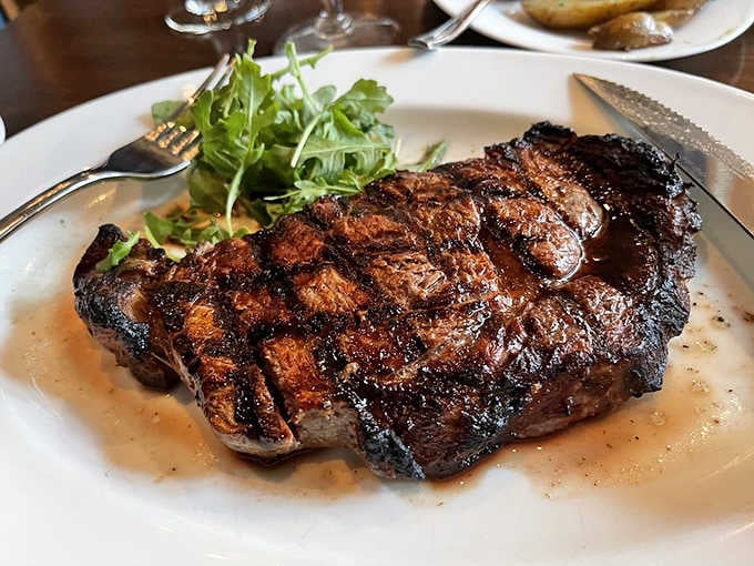 When your ribeye arrives with char marks this perfect, you know you're in capable hands tonight.