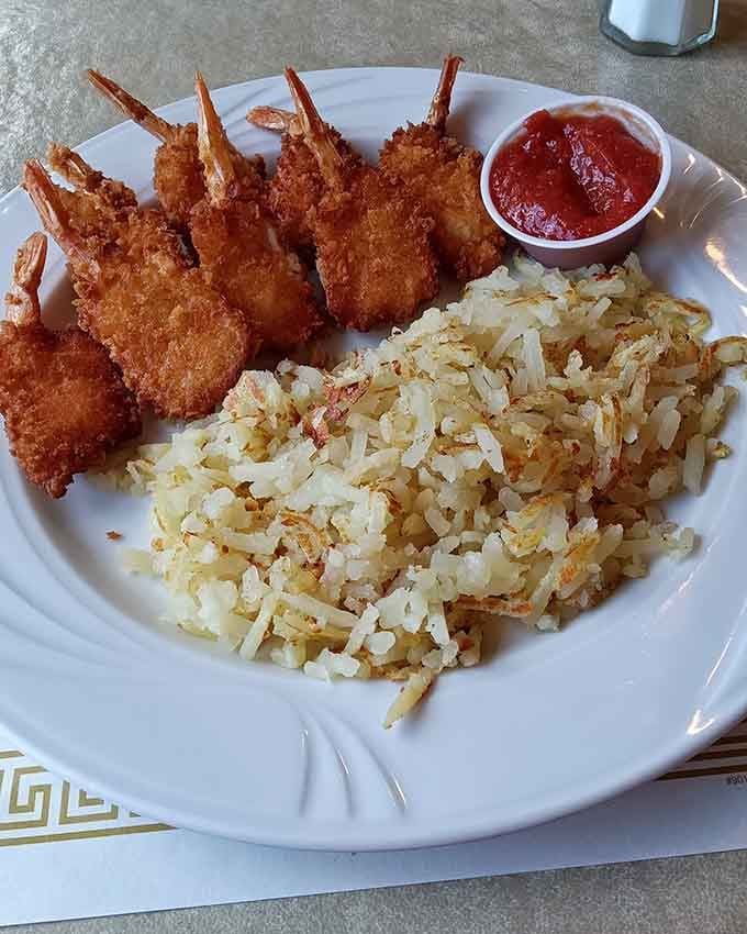 Breaded shrimp lined up like little soldiers of deliciousness, ready to march straight into your heart and stomach simultaneously.