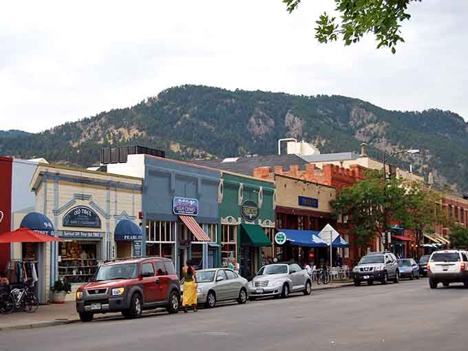 Colorful storefronts pop against mountain backdrops where shopping feels like exploring a friendly, laid-back outdoor paradise.