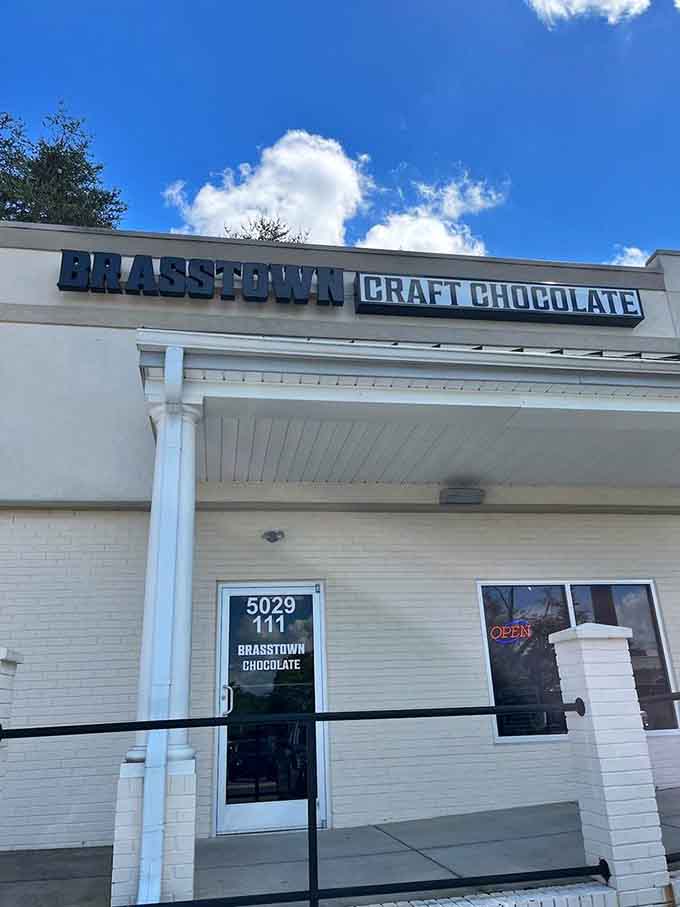 That clean white facade and bold signage promise serious bean-to-bar chocolate craftsmanship waiting inside for you.