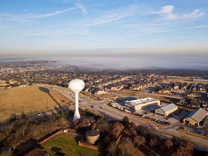 Morning mist rolls across this peaceful town like nature's own special effect, absolutely free of charge.