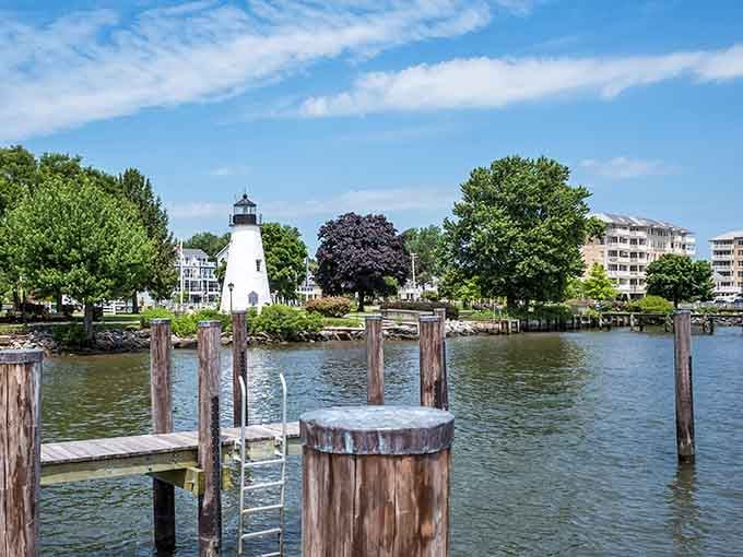 The lighthouse stands guard over the waterfront, a postcard-perfect sentinel welcoming boats and dreamers alike to shore.
