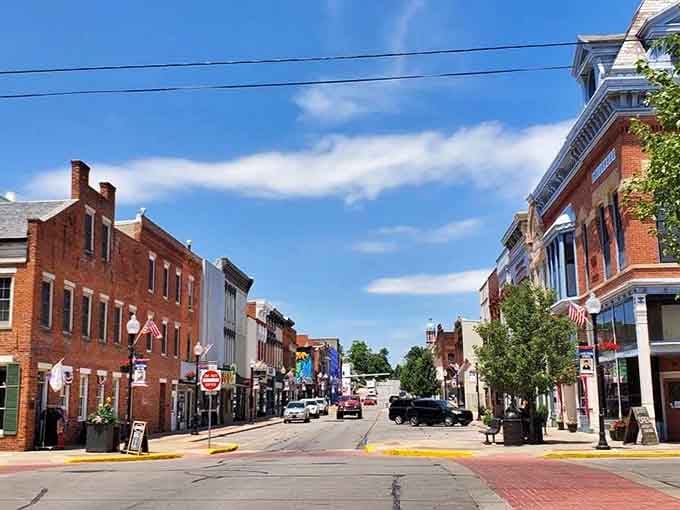 Historic storefronts stand shoulder-to-shoulder like old friends, each one holding stories and maybe the best pie you've ever tasted.
