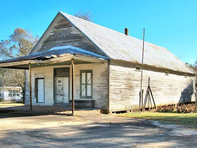This weathered beauty stands as a testament to simpler times when front porches meant everything.