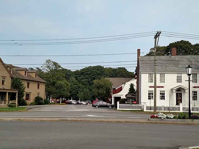 This peaceful intersection captures small-town America at its finest, where traffic lights seem almost unnecessary and quaint.