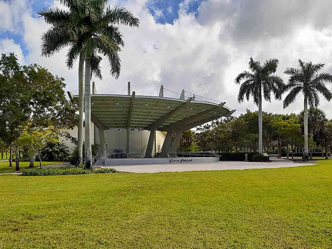 This modern pavilion rises from the park like a spaceship landed among the palms, bringing contemporary style to outdoor gatherings.