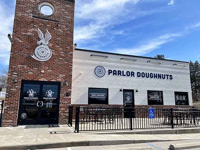 That distinctive brick tower rises like a monument to the art of layered doughnuts done absolutely right.