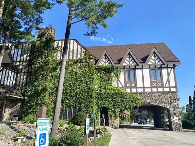 Ivy-covered Tudor architecture meets mountain resort luxury in this stunning entrance that promises unforgettable experiences inside.