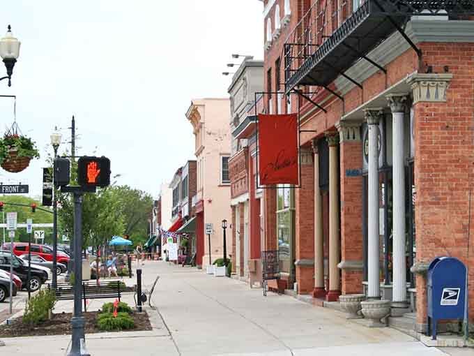Those grand columns and vintage streetlights transport you to an era when downtown meant community, not just a GPS destination.