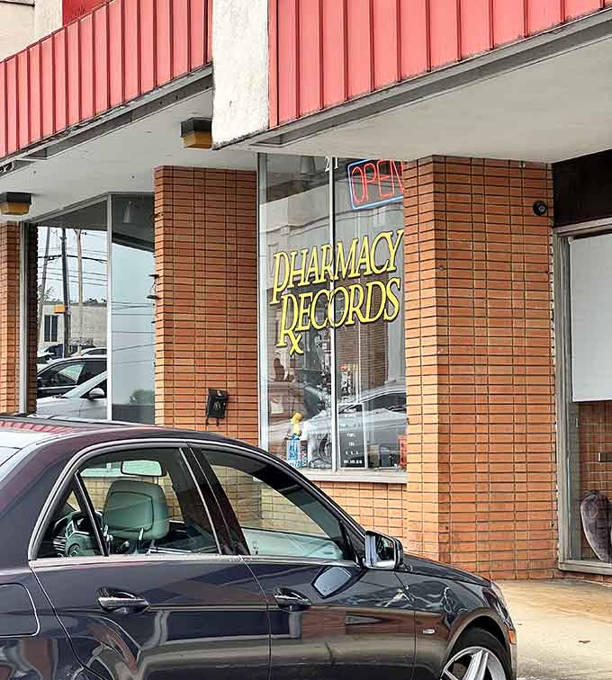 That golden script and mid-century tile work transport you straight back to when record shopping was an art form.