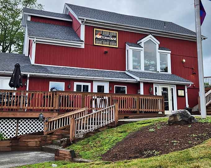 The classic red barn architecture with wraparound deck promises the kind of hearty New England dining experience that never goes out of style.