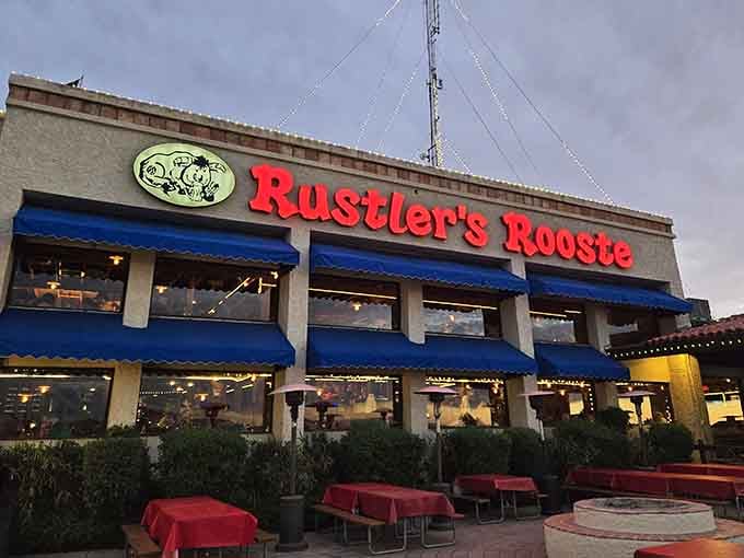 Those bright blue awnings shelter picnic tables where families gather for seriously good Western-style beef.