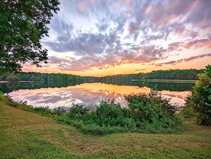 Cotton candy skies reflecting on glass-smooth water prove that nature's the real artist around here every evening.