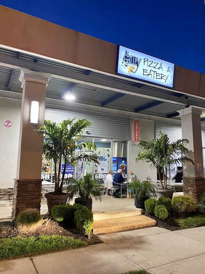 Palm trees flanking a pizza joint at twilight? The Galley brings unexpected tropical vibes to your slice experience.