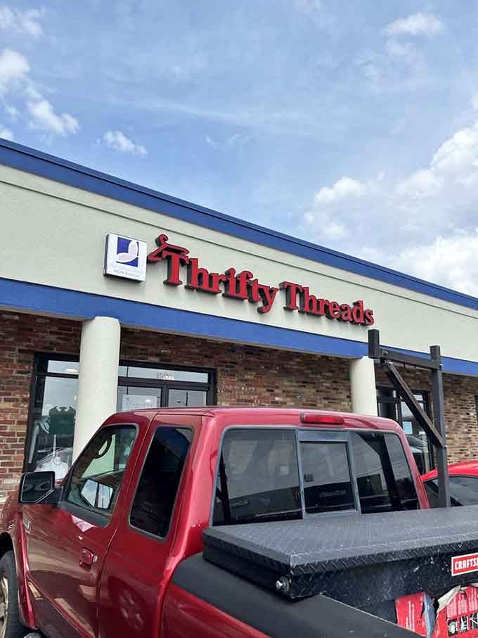 Dramatic clouds frame this inviting storefront where smart shoppers discover that being thrifty never goes out of style.