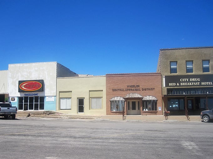 Historic storefronts and clear blue skies create the perfect backdrop for authentic home-style cooking experiences.